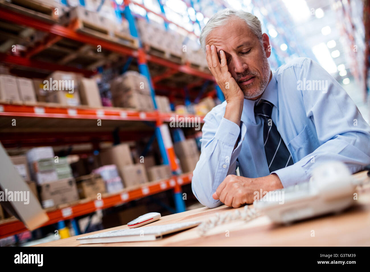 Anxious warehouse manager Stock Photo - Alamy