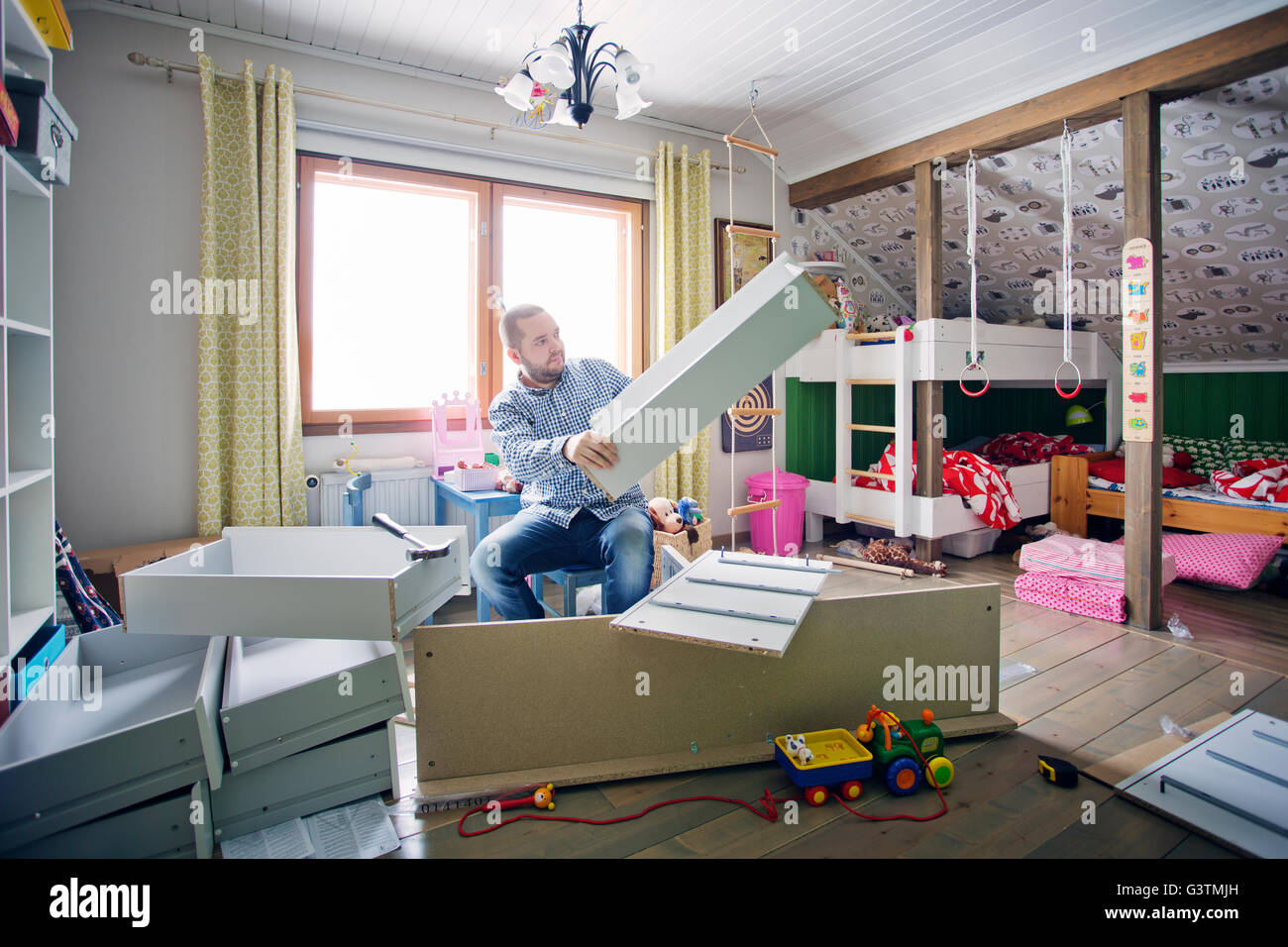 Man building hi-res stock photography and images - Alamy