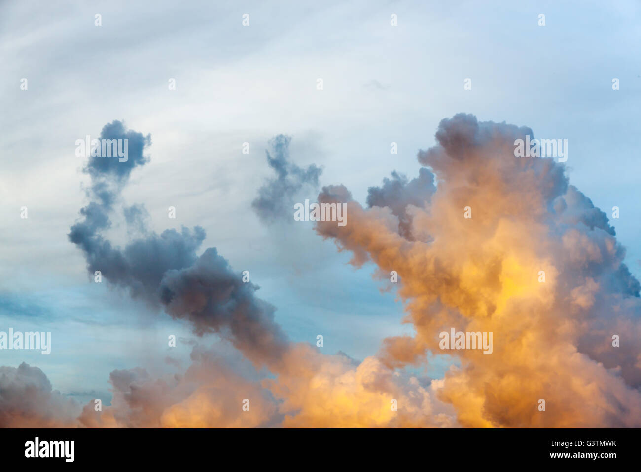 Sunlight reflective clouds on the backdrop of blue sky Stock Photo - Alamy