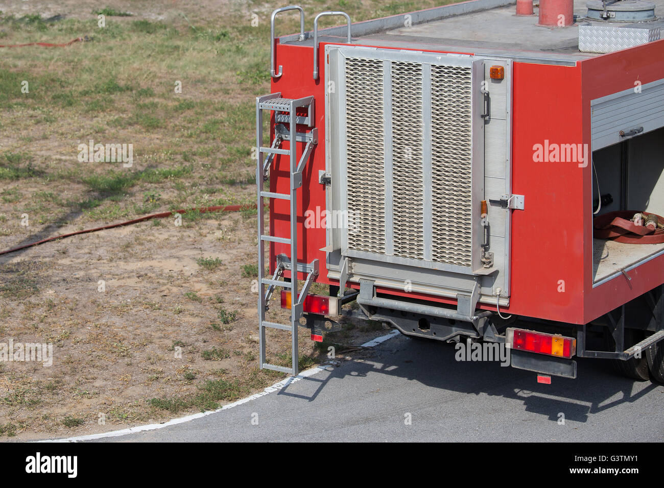 rear view of red fire truck Stock Photo - Alamy