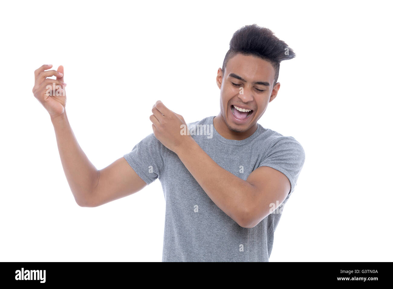 Portrait of a young african american man dancing of joy. Isolated image ...