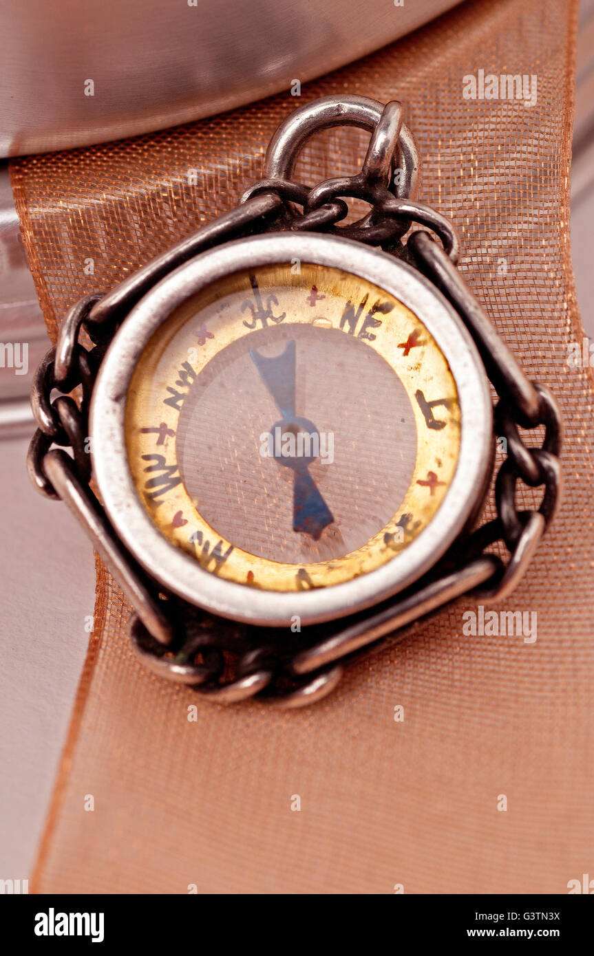 Macro of antique compass Stock Photo - Alamy