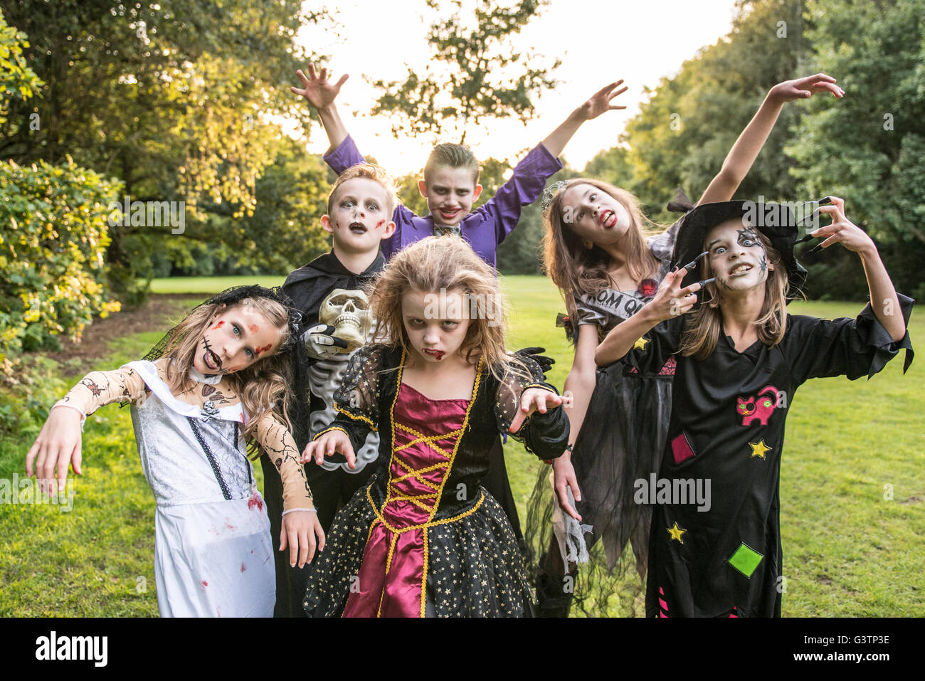 Children pose in zombie costumes for Halloween Night Stock Photo - Alamy