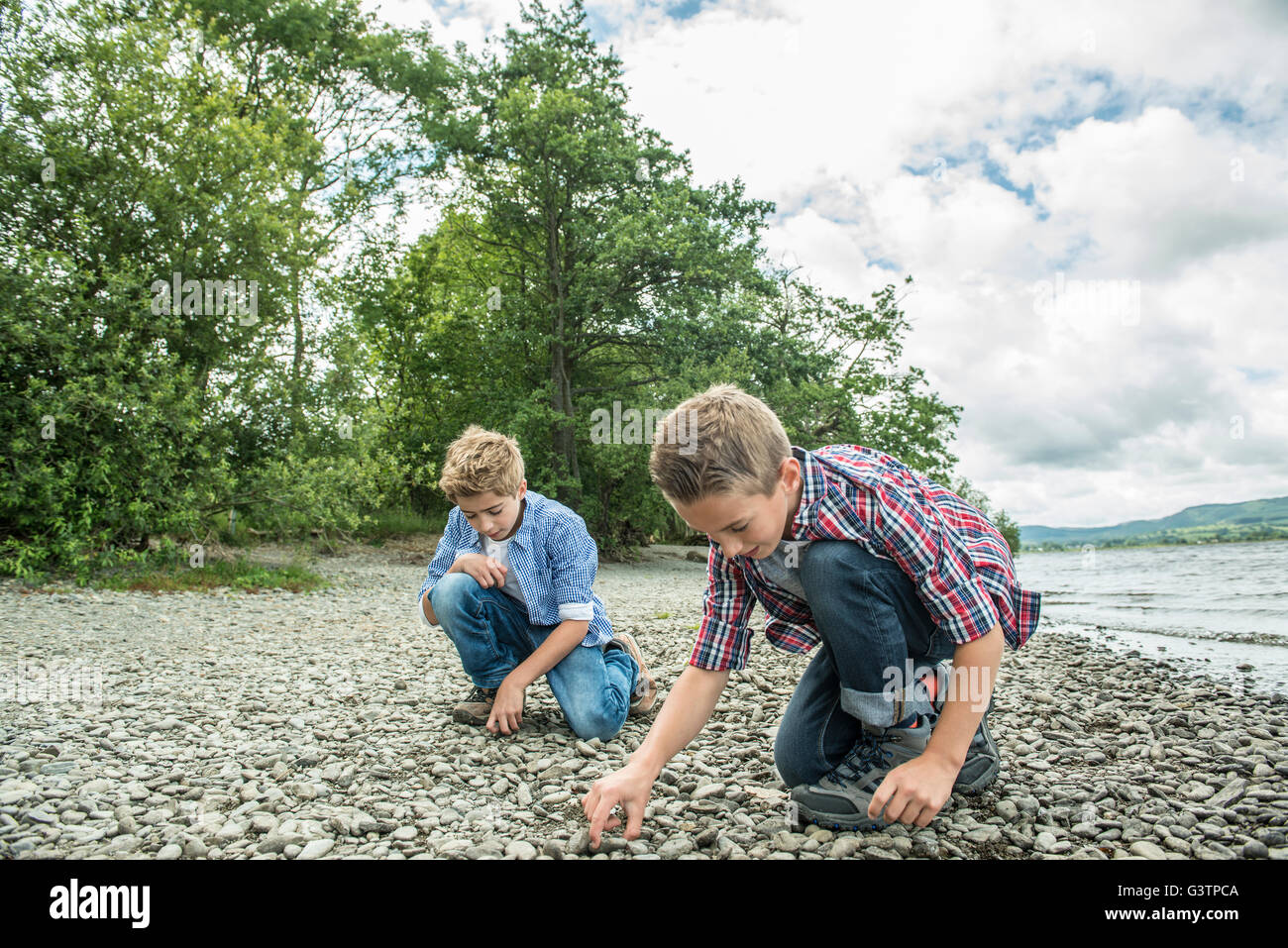 Boys playing on the shore hi-res stock photography and images - Alamy