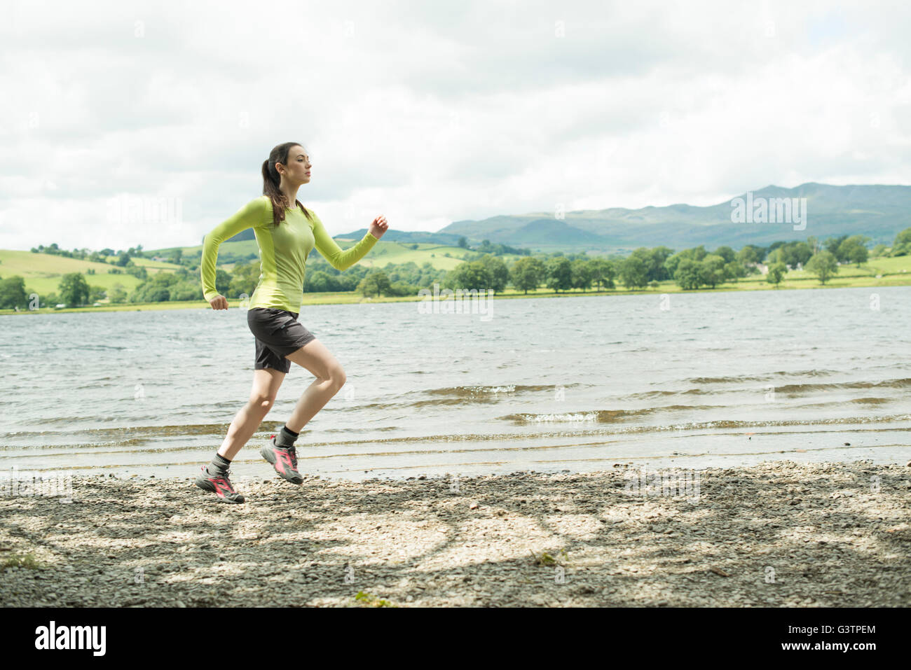 Running beside lake hi-res stock photography and images - Alamy