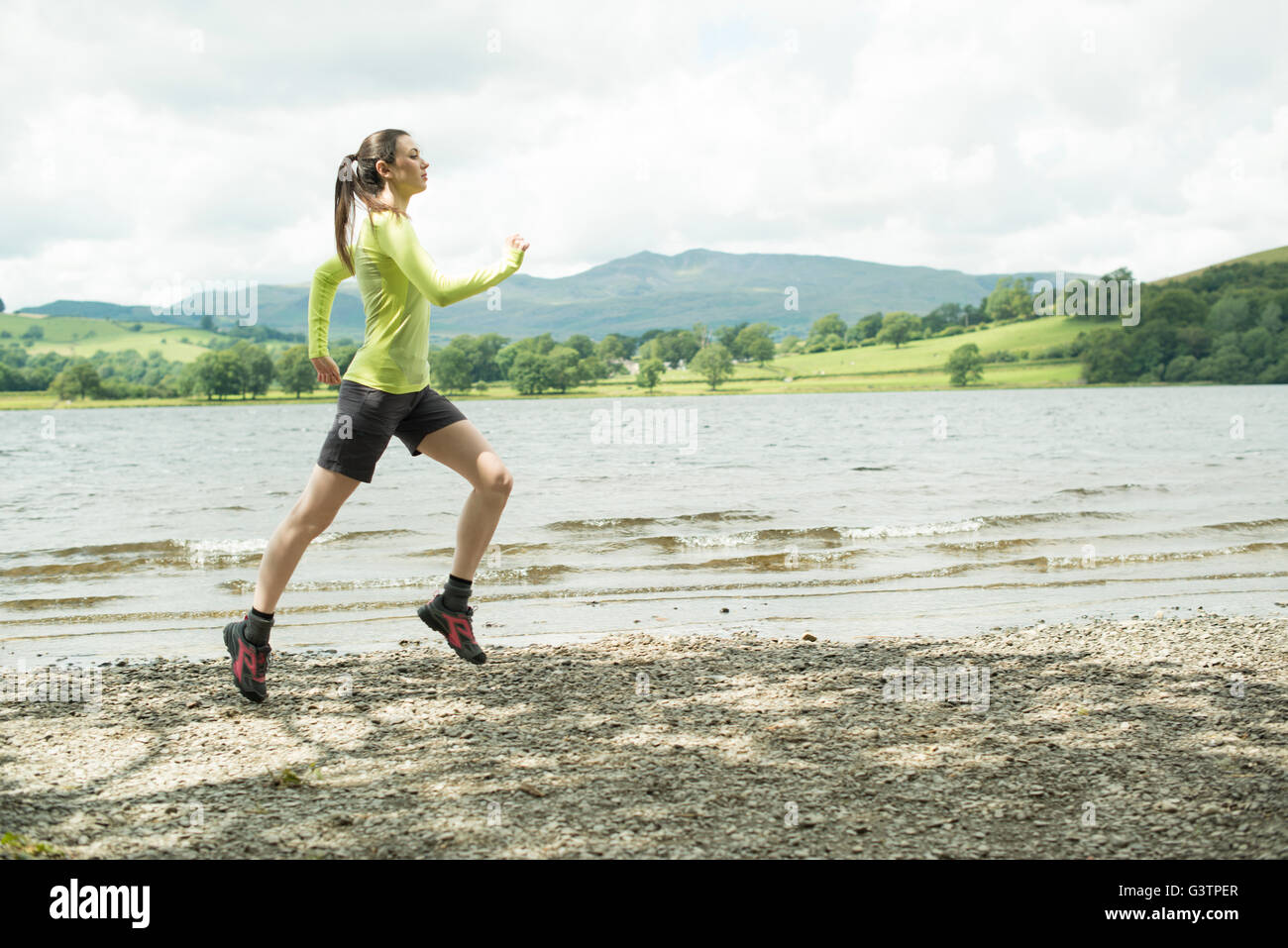 Running beside lake hi-res stock photography and images - Alamy