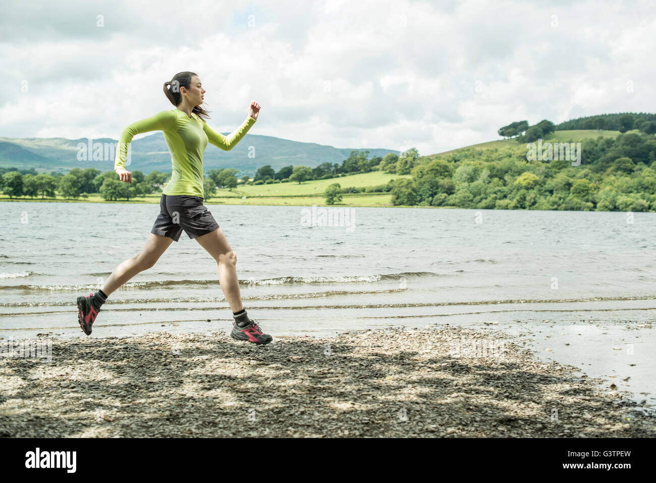 Running beside lake hi-res stock photography and images - Alamy