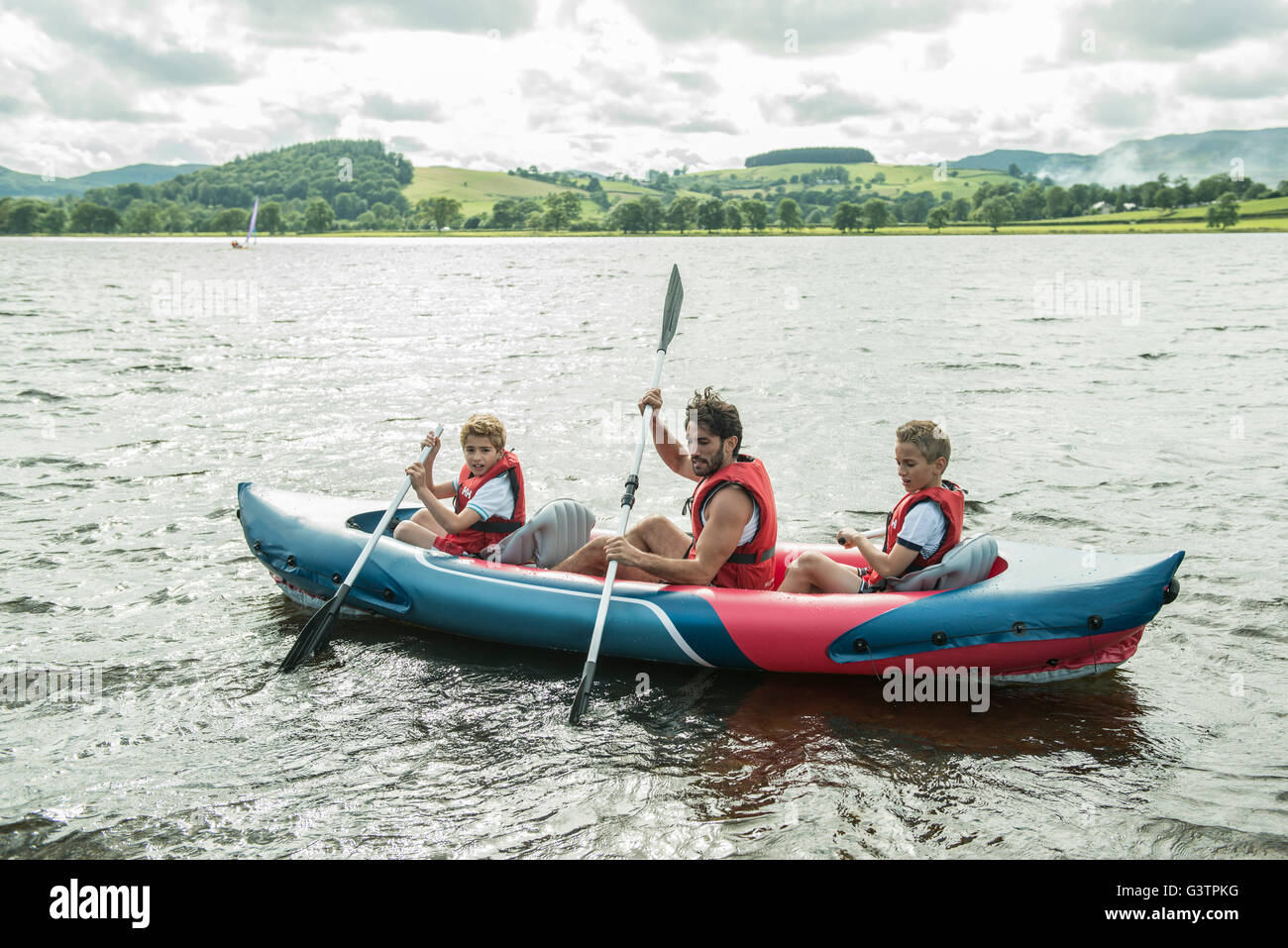 Boys in kayak hi-res stock photography and images - Alamy