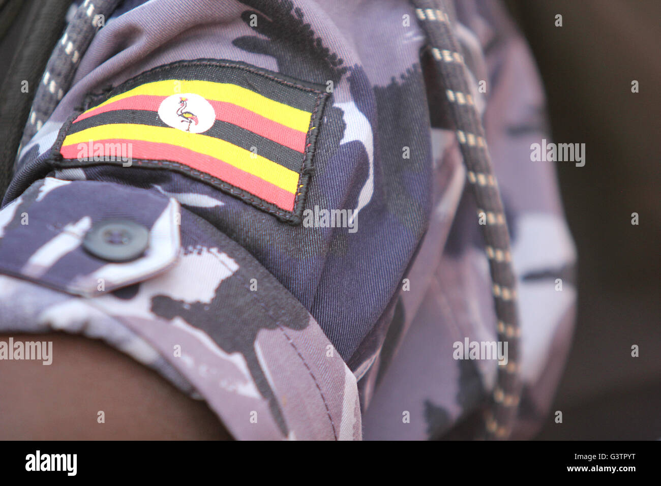 A Ugandan Police officer pictured in Kampala city Stock Photo - Alamy