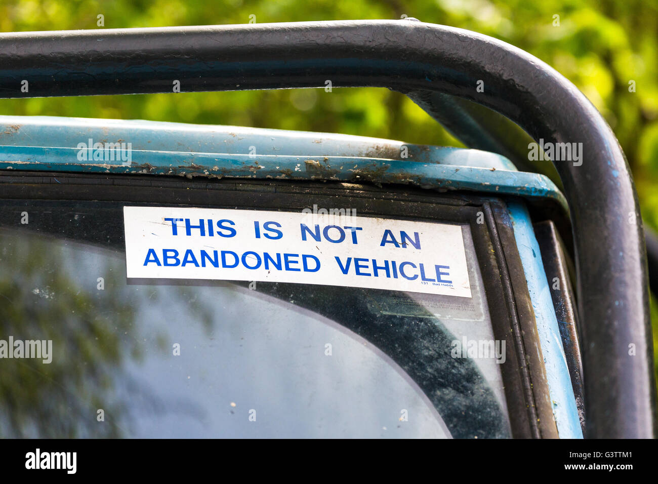 "This is not an abandoned vehicle" sign. . Sign on old vehicle England ...