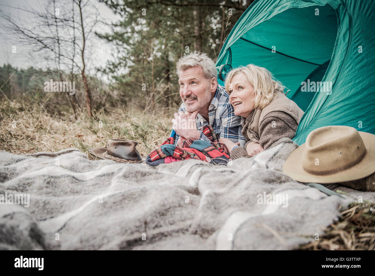 Senior couple enjoying the wilderness from their campsite Stock Photo ...