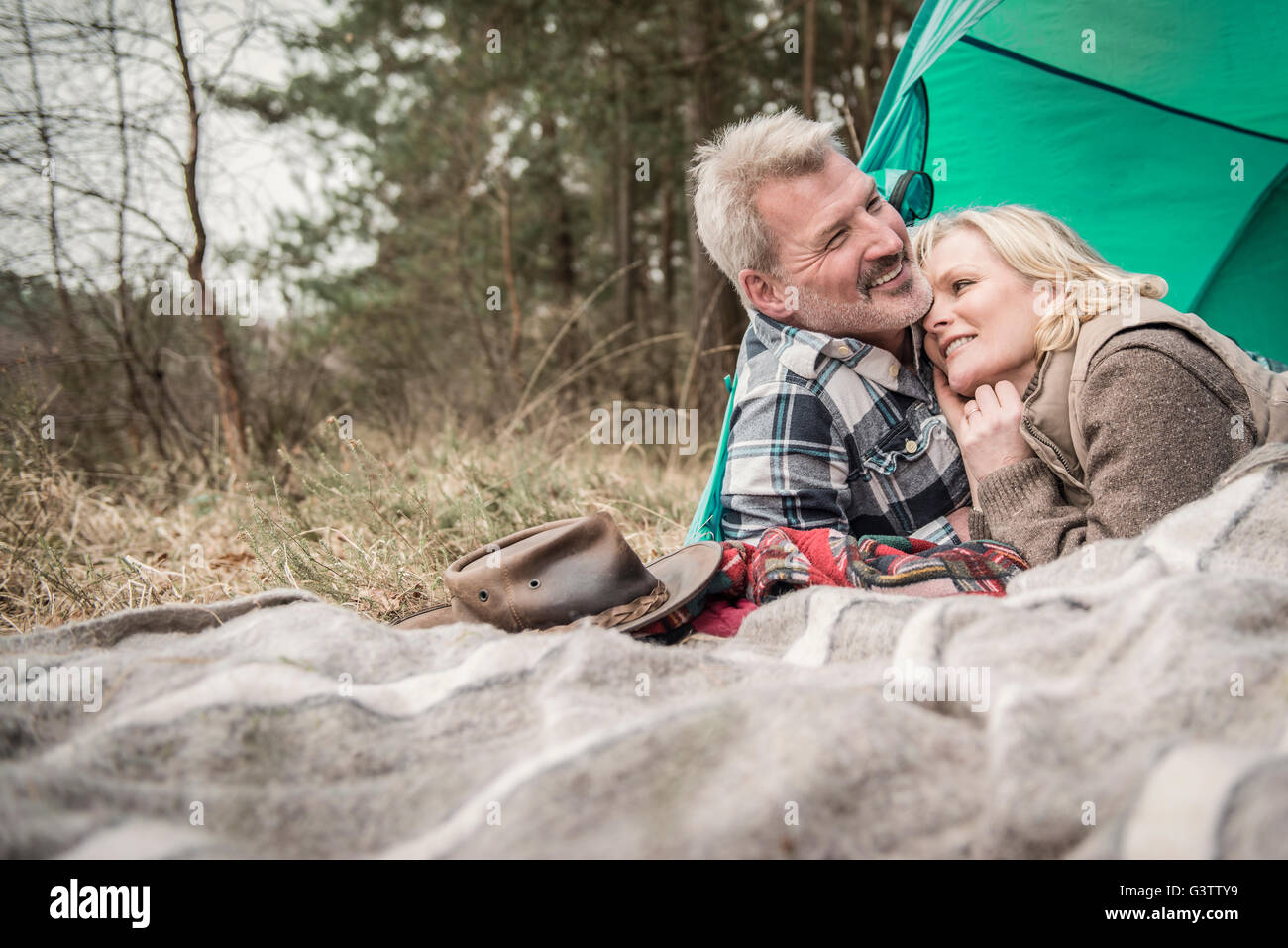 Senior couple enjoying being together at their campsite Stock Photo - Alamy
