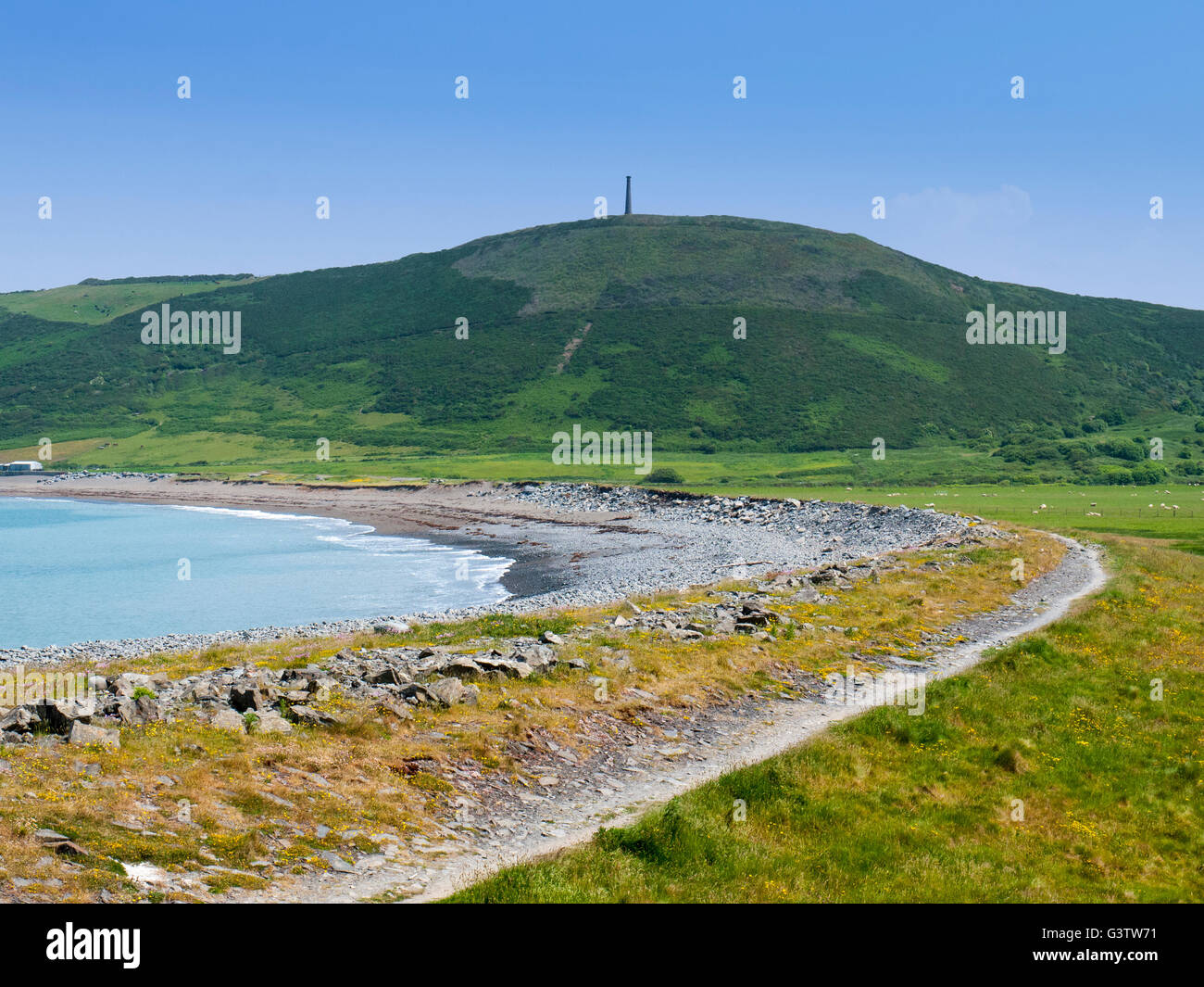 Tan Y Bwich beach with Wellington monument on top of Pen Dinas in ...