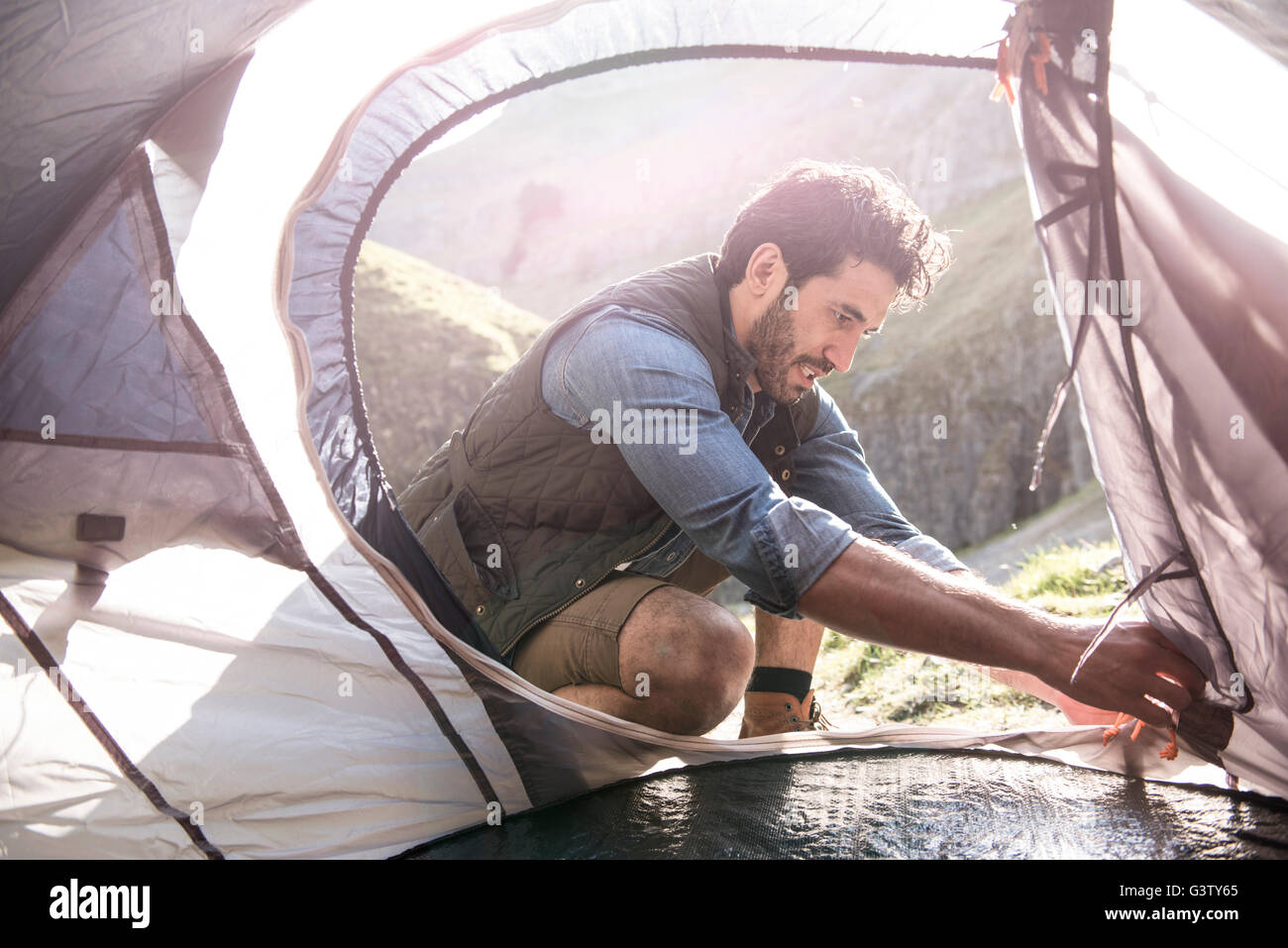 Pitching tent hi-res stock photography and images - Alamy