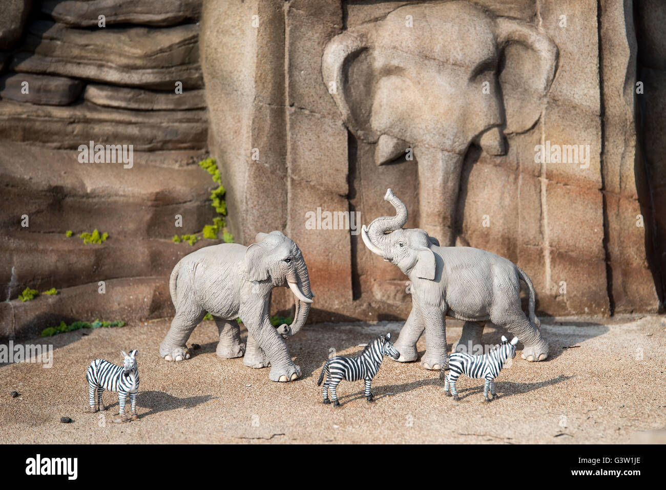 Elephant and zebra toy Stock Photo - Alamy