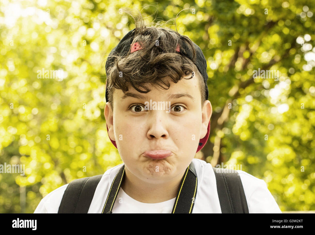 Young boy making the crazy face. Positive emotions. Funny youngster ...