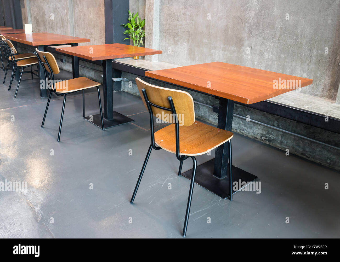 Empty wooden table in gray room, stock photo Stock Photo - Alamy