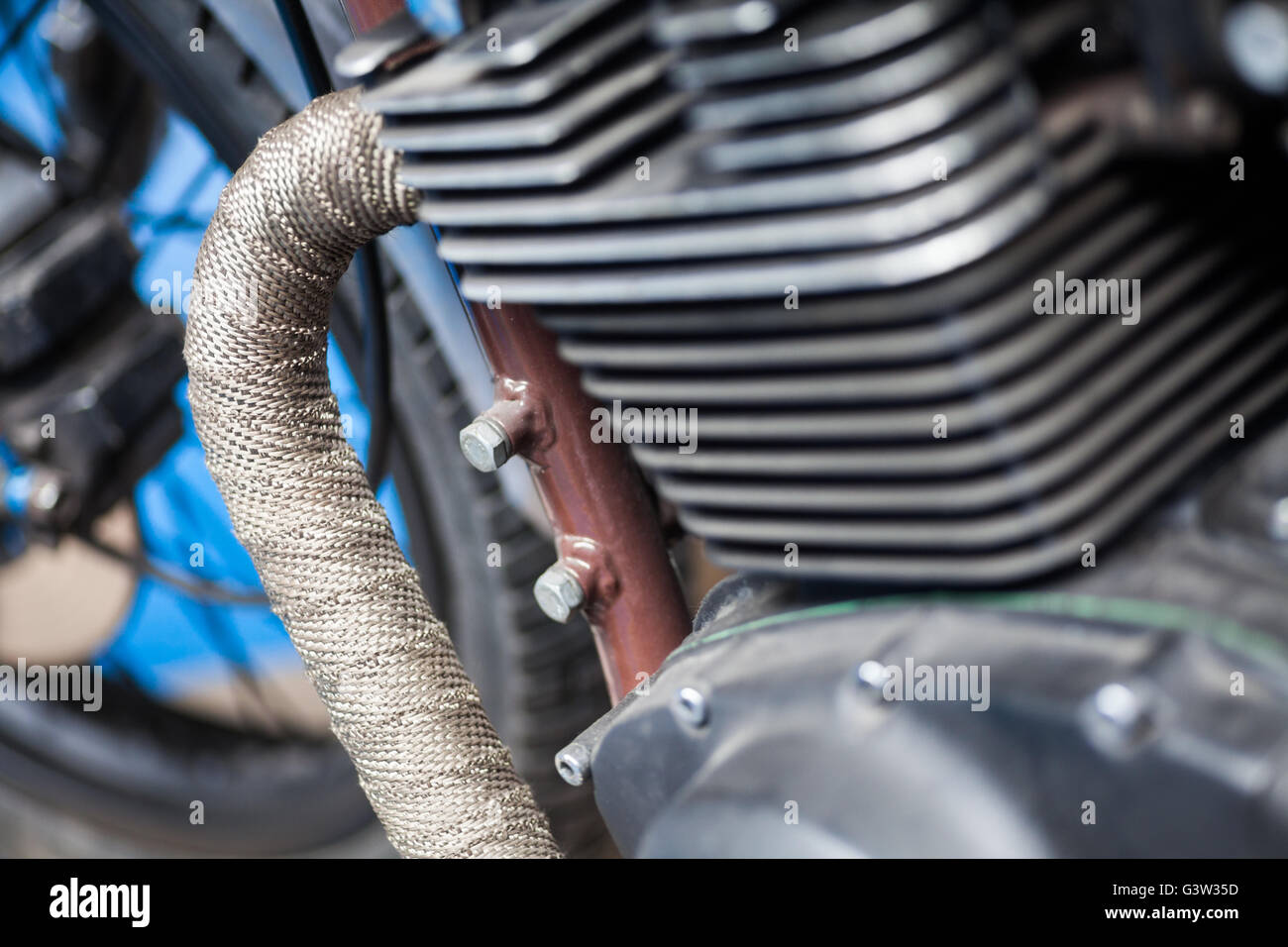 Detail of a motorcycle exhaust pipes and cylinders Stock Photo - Alamy