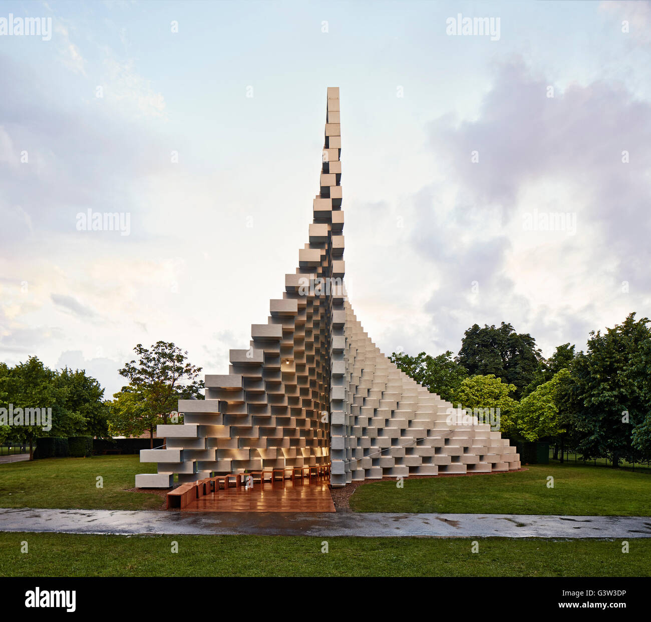 Elevation of undulating sculptural pavilion at dusk, front elevation ...