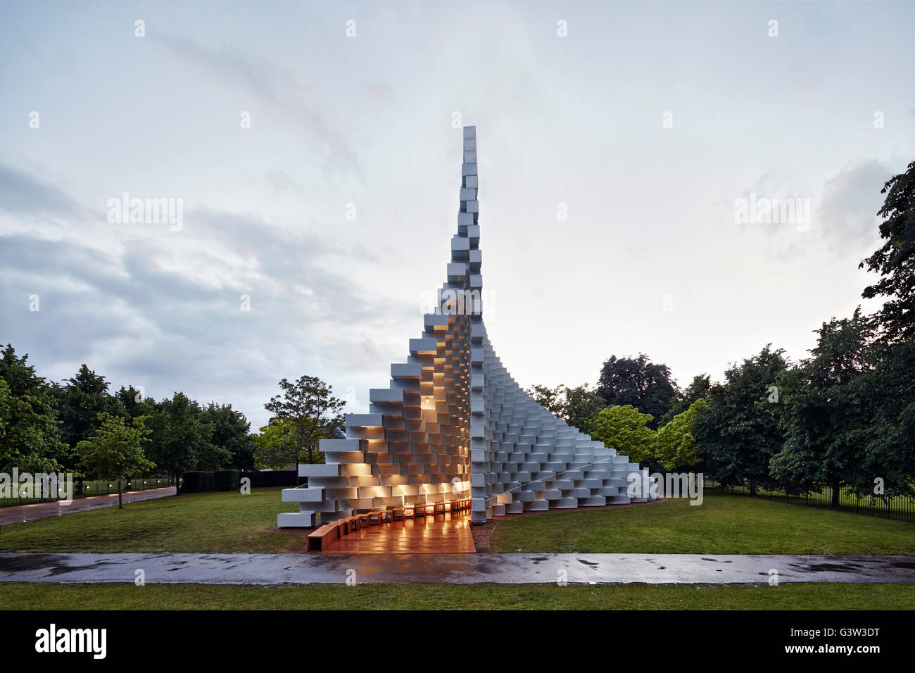 Elevation of undulating sculptural pavilion at dusk, front elevation ...