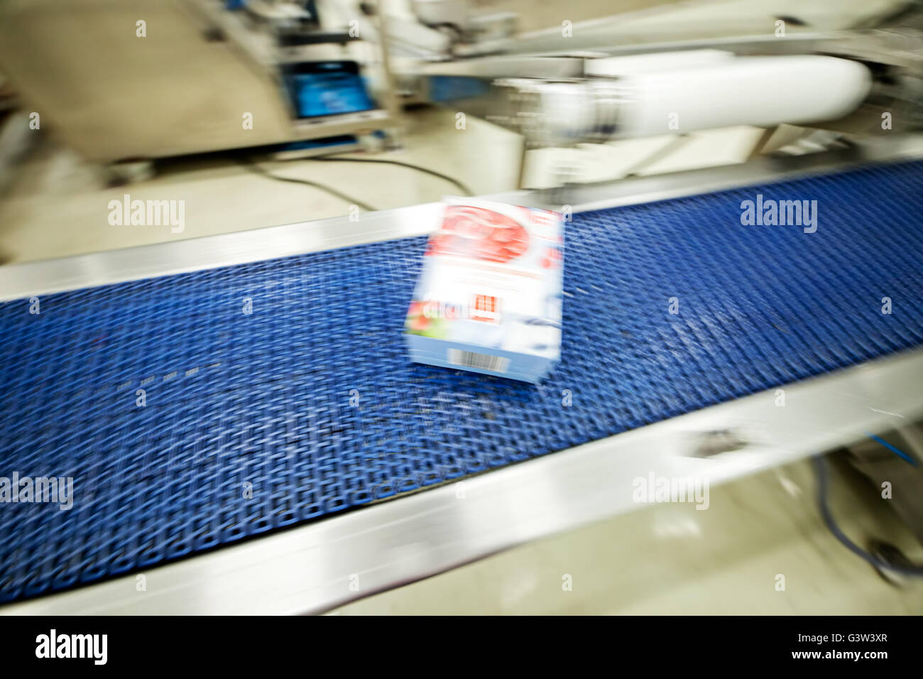 frozen food packing and sorting industry equipment Stock Photo - Alamy