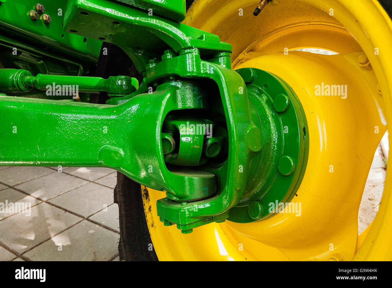 Transmission unit of tractor's front wheel with tire Stock Photo - Alamy