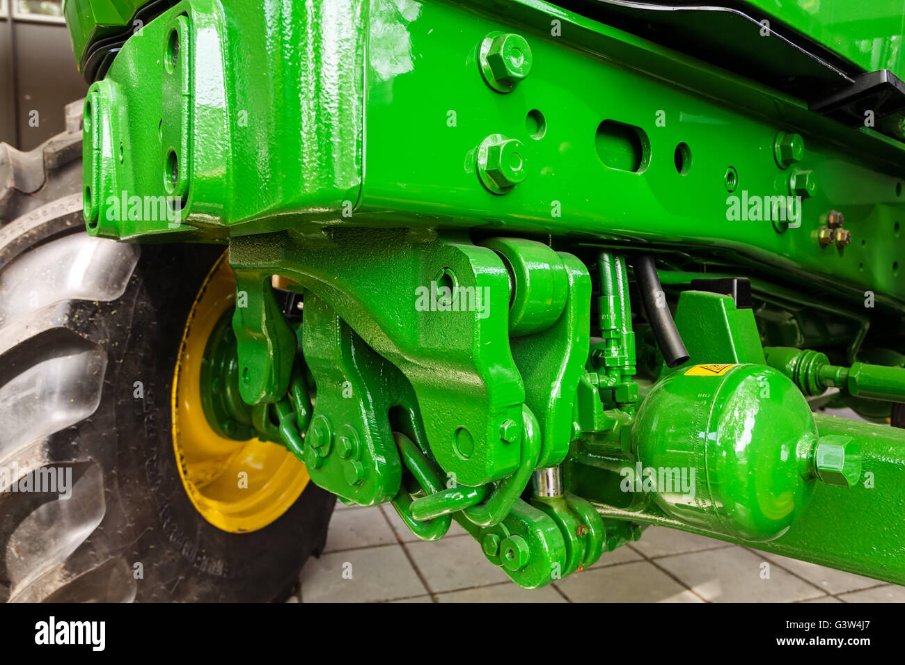 Transmission unit of tractor's front wheel with tire Stock Photo - Alamy
