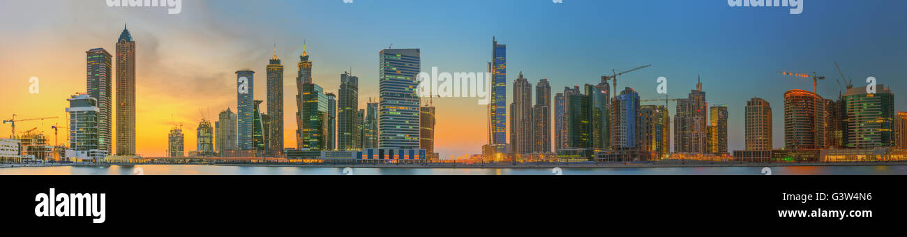 Panoramic view of Business bay and downtown area of Dubai, reflection ...