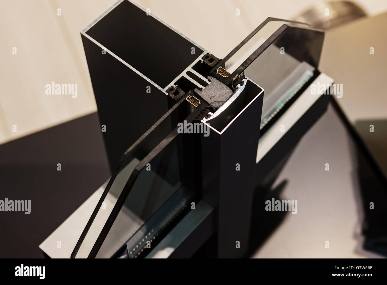 Cut of the window profile with metal, glass and insulation Stock Photo ...