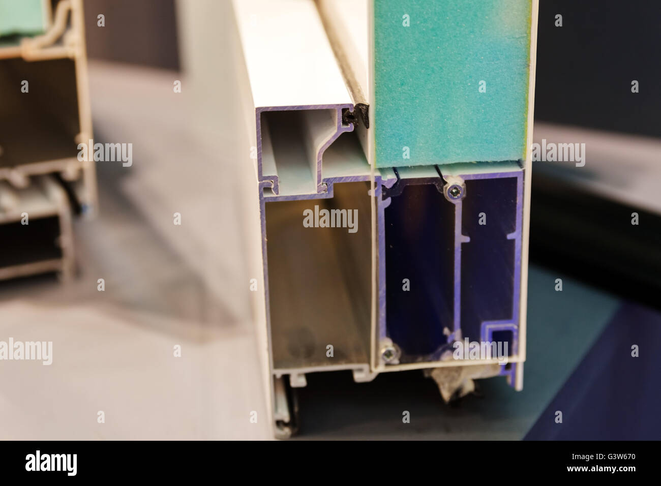 Cut of the window profile with metal, glass and insulation Stock Photo ...