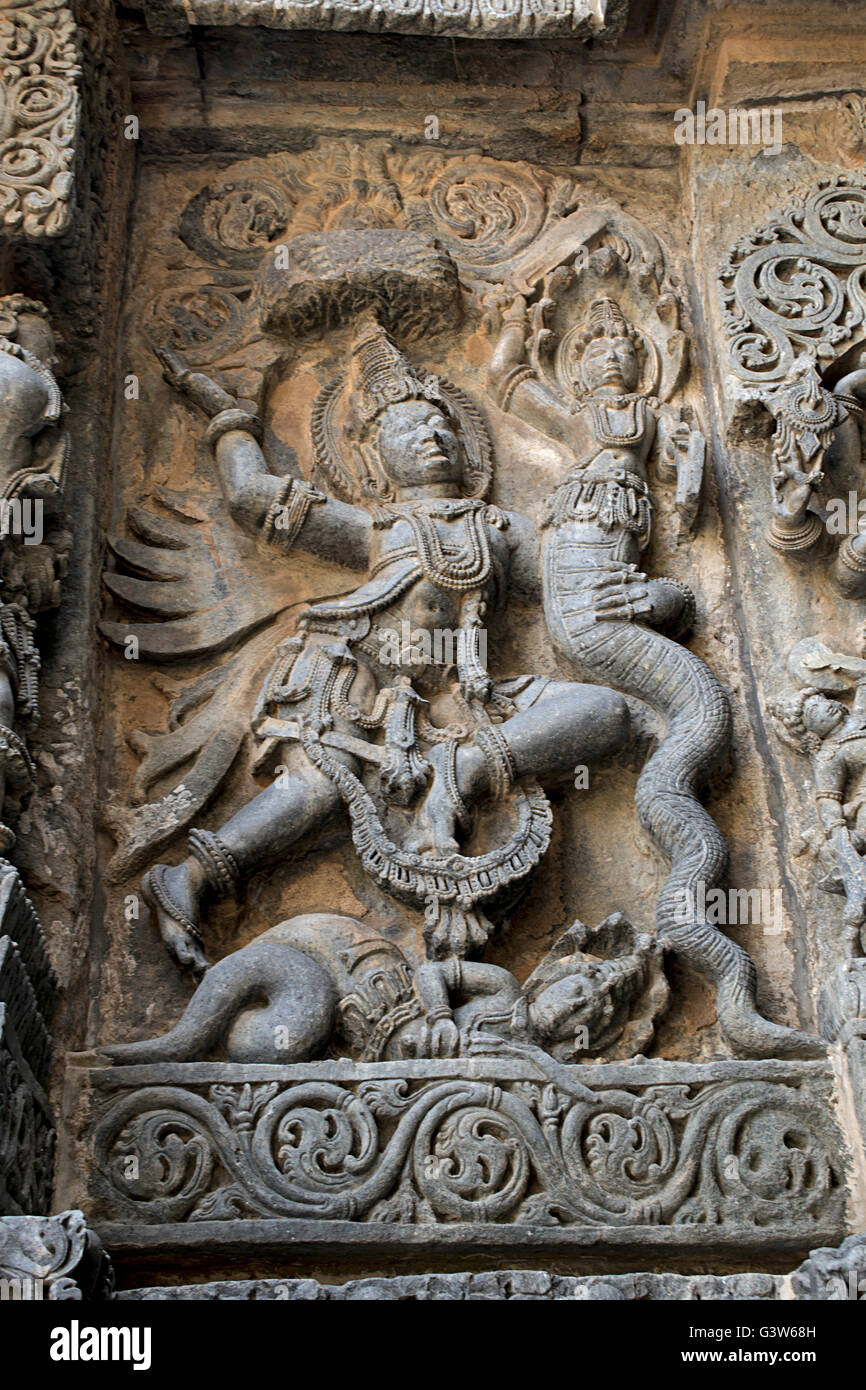 Sculpture depicting Garuda fighting with the snakes , west side ...