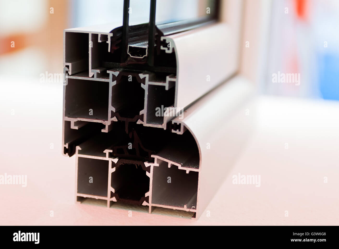 Cut of the window profile with metal, glass and insulation Stock Photo ...