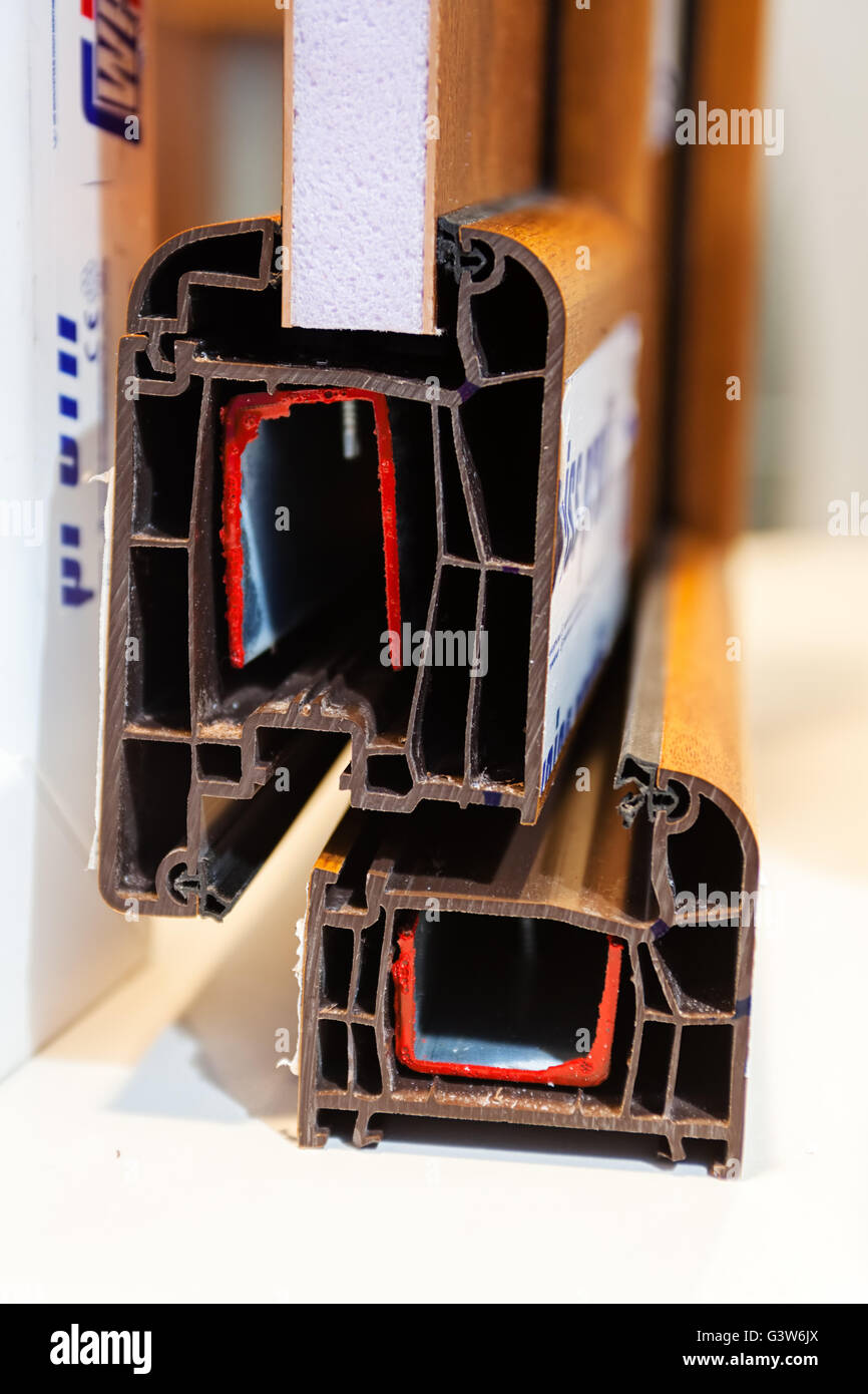 Cut of the window profile with metal, glass and insulation Stock Photo ...