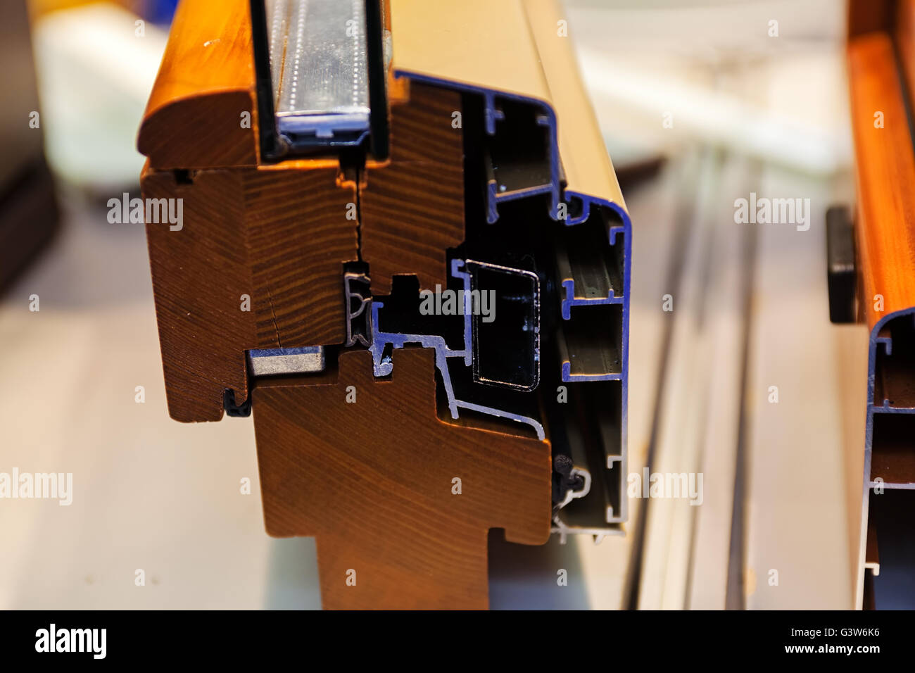 Cut of the window profile with metal, glass and insulation Stock Photo ...