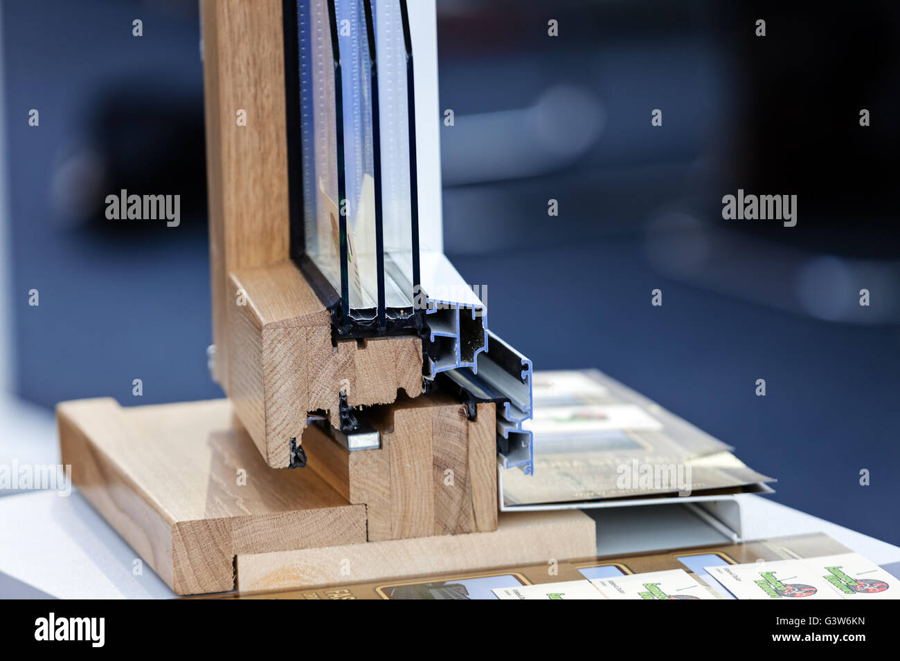 Cut of the window profile with metal, glass and insulation Stock Photo ...