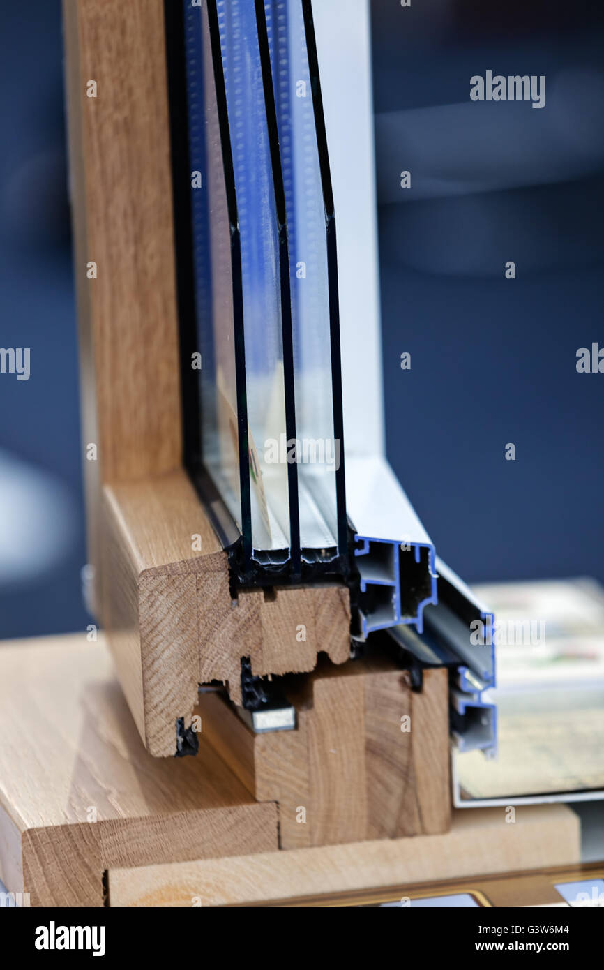 Cut of the window profile with metal, glass and insulation Stock Photo ...