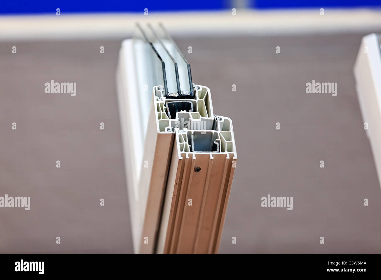 Cut of the window profile with metal, glass and insulation Stock Photo ...