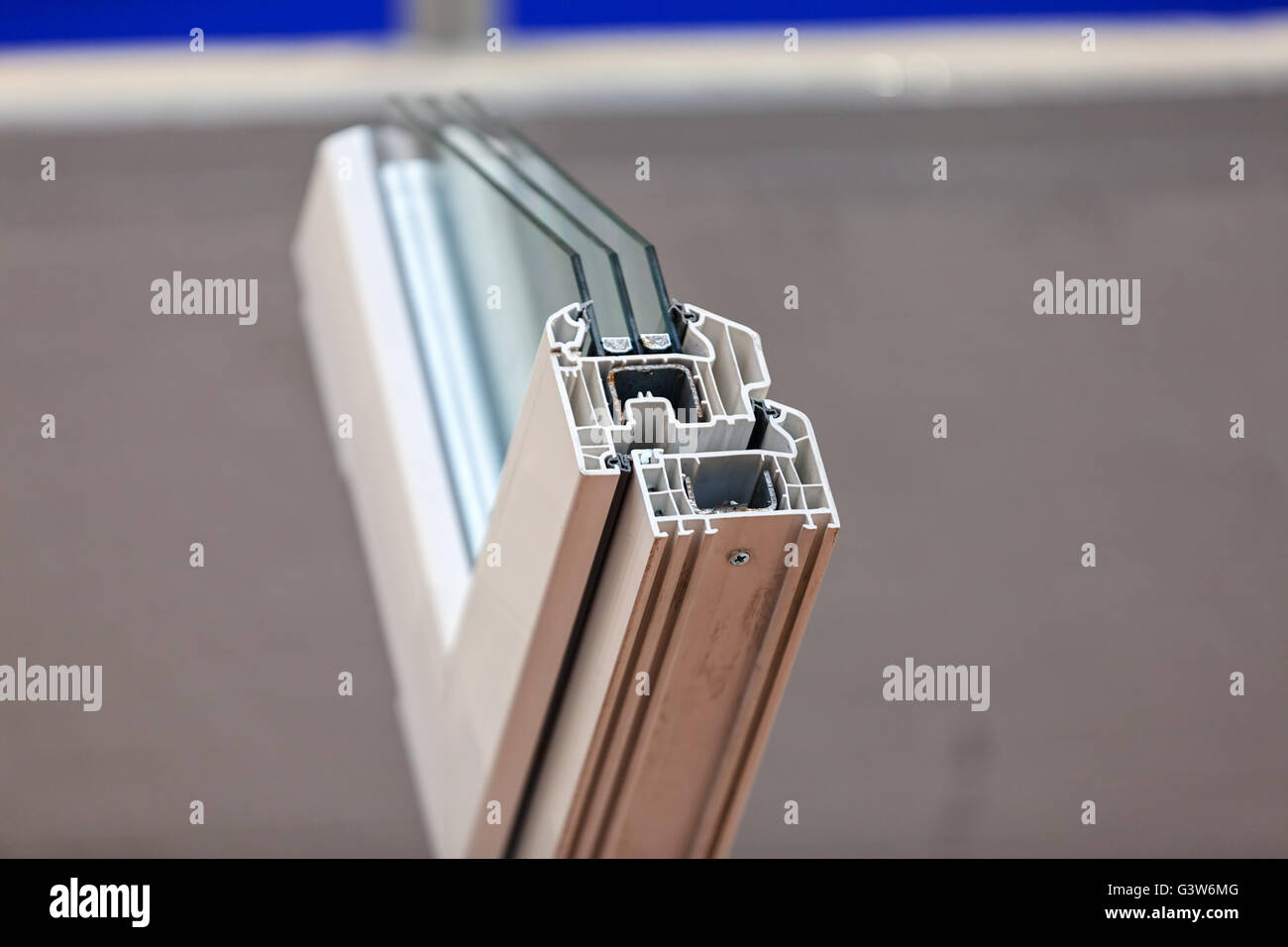 Cut of the window profile with metal, glass and insulation Stock Photo ...