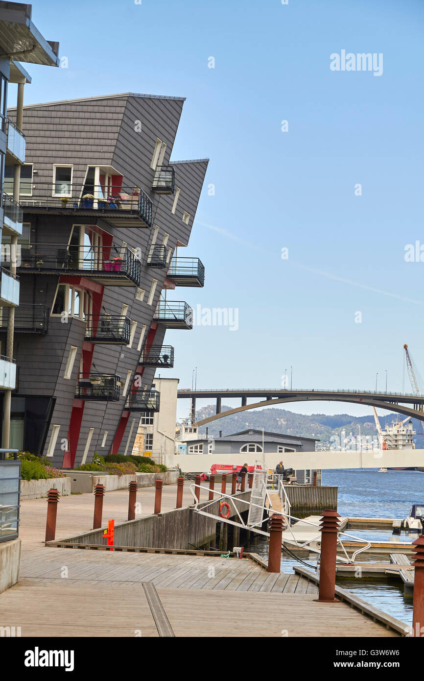 Modern building at the waterfront with docks outside and bridges in the ...