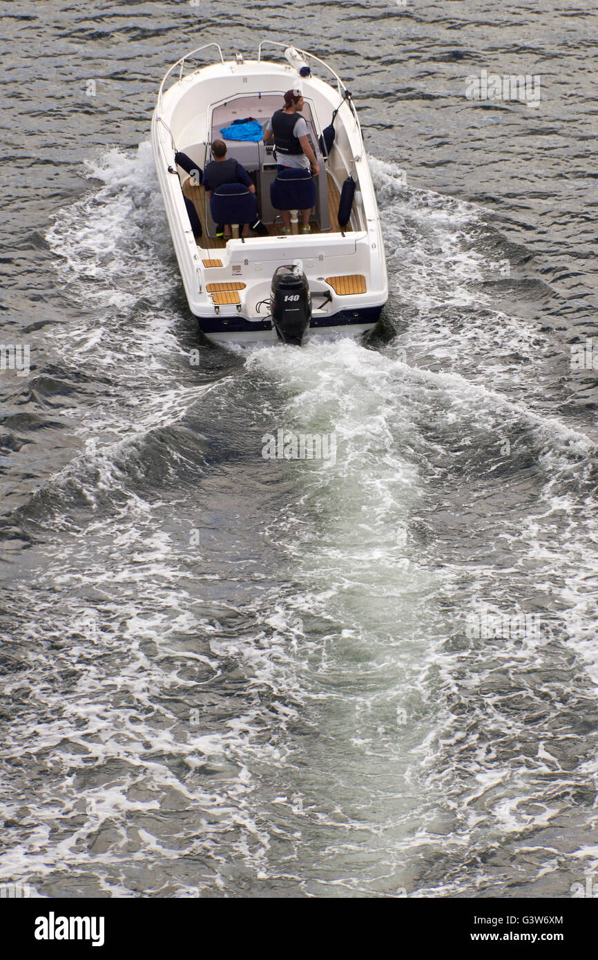 Speedboat with 2 persons aerial view Stock Photo - Alamy