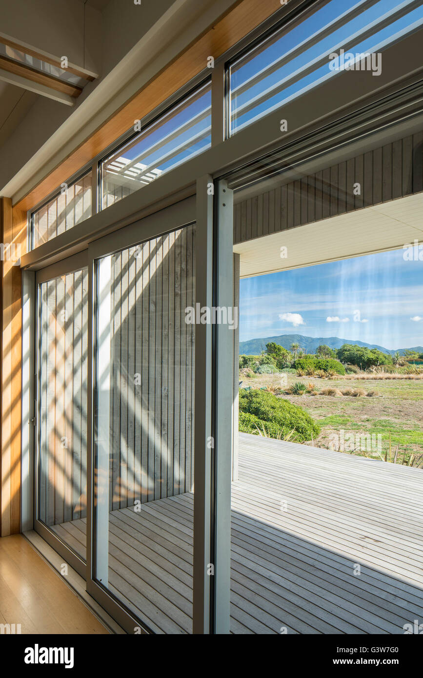 Through window and out to garden with exterior sun control blinds ...