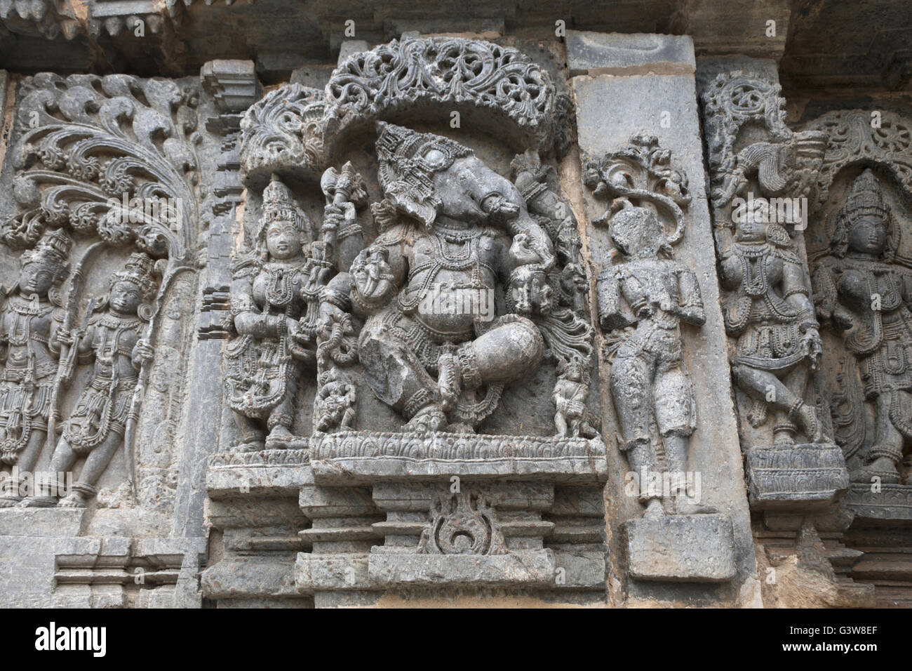Wall panel reliefs depicting (From left) Kamdev, his wife Rati, and ...