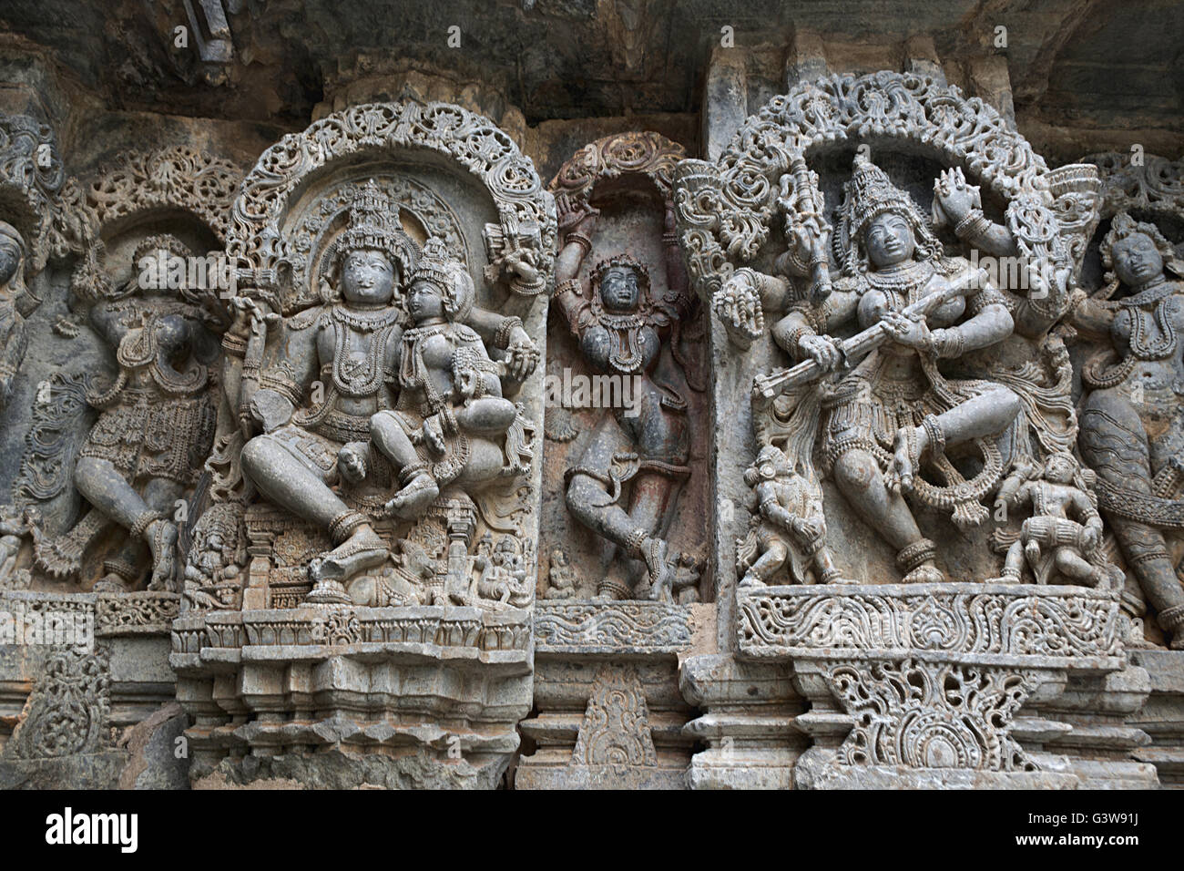 Ornate wall panel reliefs depicting (from left) Shiva-Parvati, dancing ...