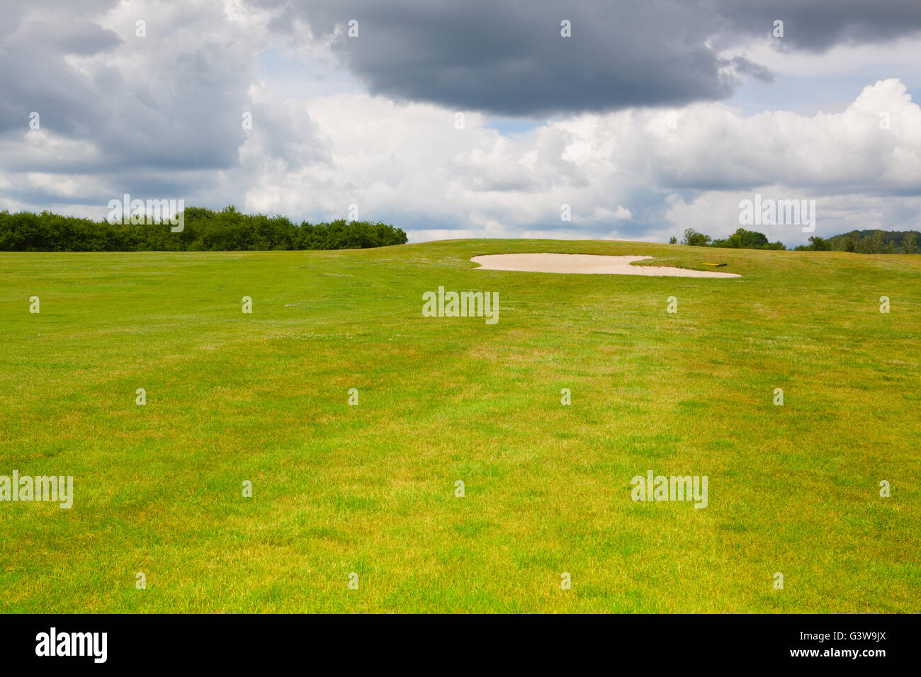 Sand golf bunker on a empty golf course before storm Stock Photo - Alamy