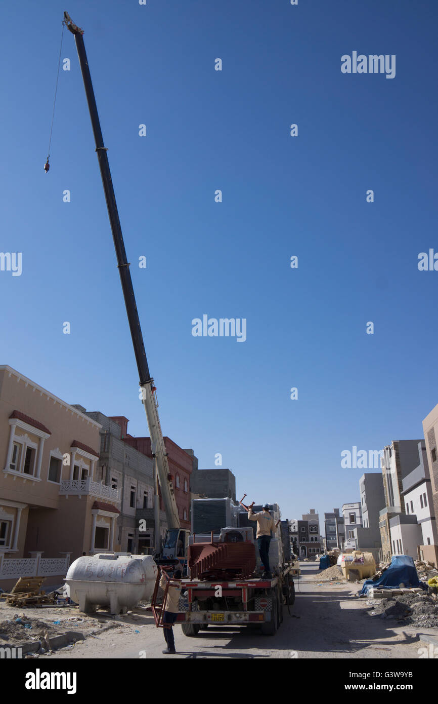 Crane unloading hi-res stock photography and images - Alamy