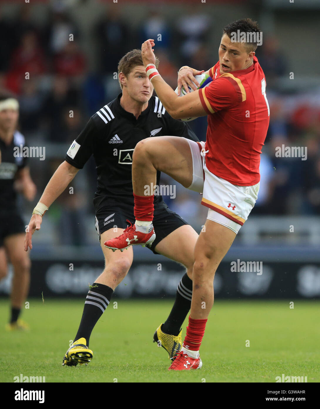 New Zealand's Jordie Barrett (left) tackles Wales' Jared Rosser during ...
