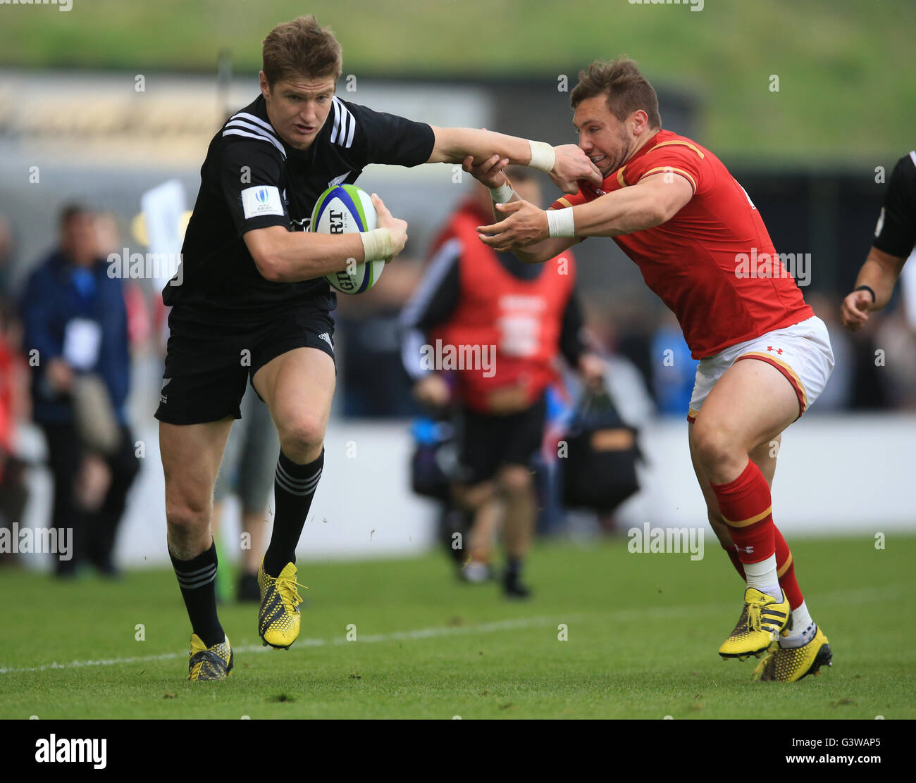 New Zealand's Jordie Barrett is tackled by Wales' Dafydd Hughes (right ...