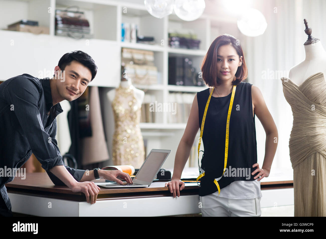 Portrait of fashion designers Stock Photo - Alamy