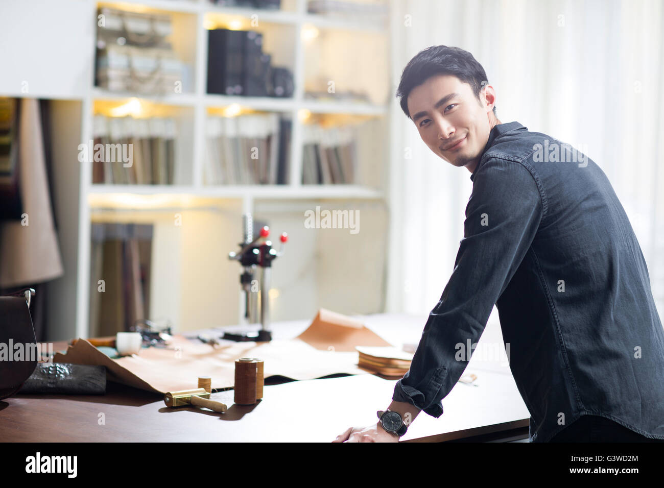 Craftsman working in his studio Stock Photo - Alamy