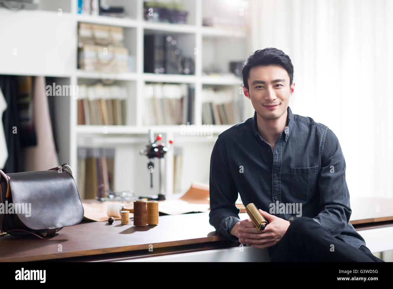 Craftsman working in his studio Stock Photo - Alamy
